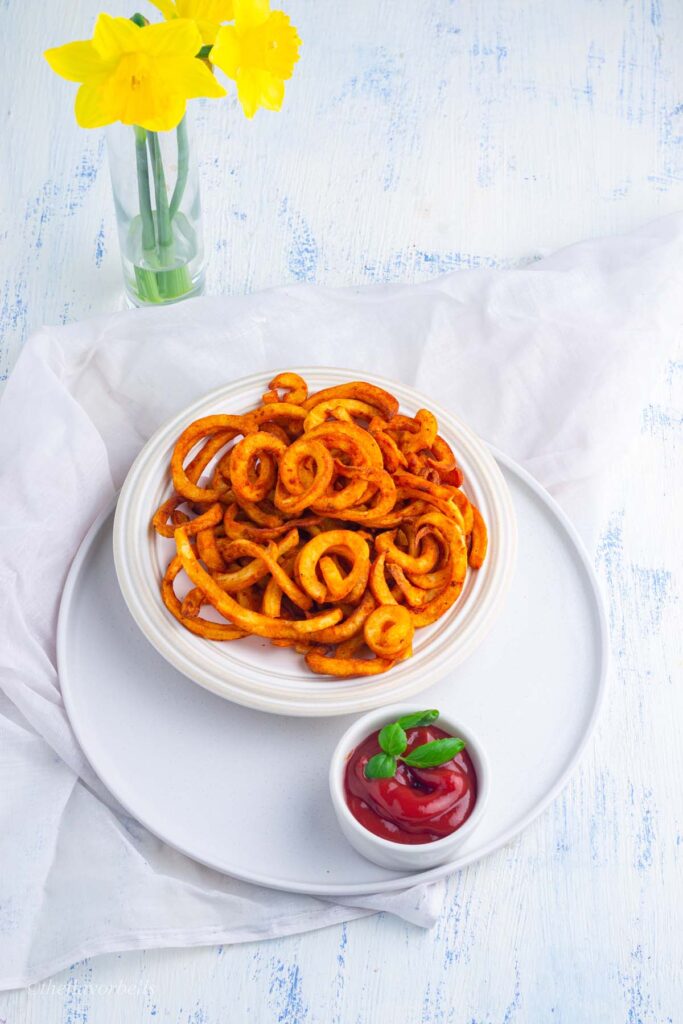 Air fryer Curly Fries: Quick and Tasty! - The Flavor Bells